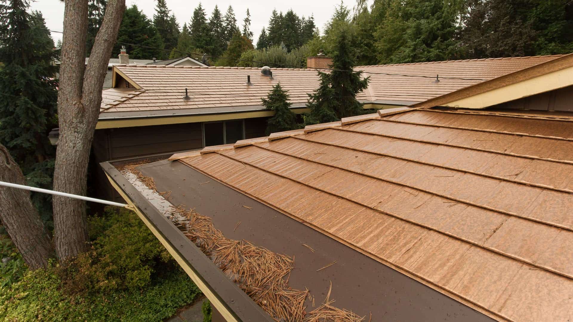 Bellevue, WA - Aged Copper Cedar Shingles — Interlock Metal Roofing